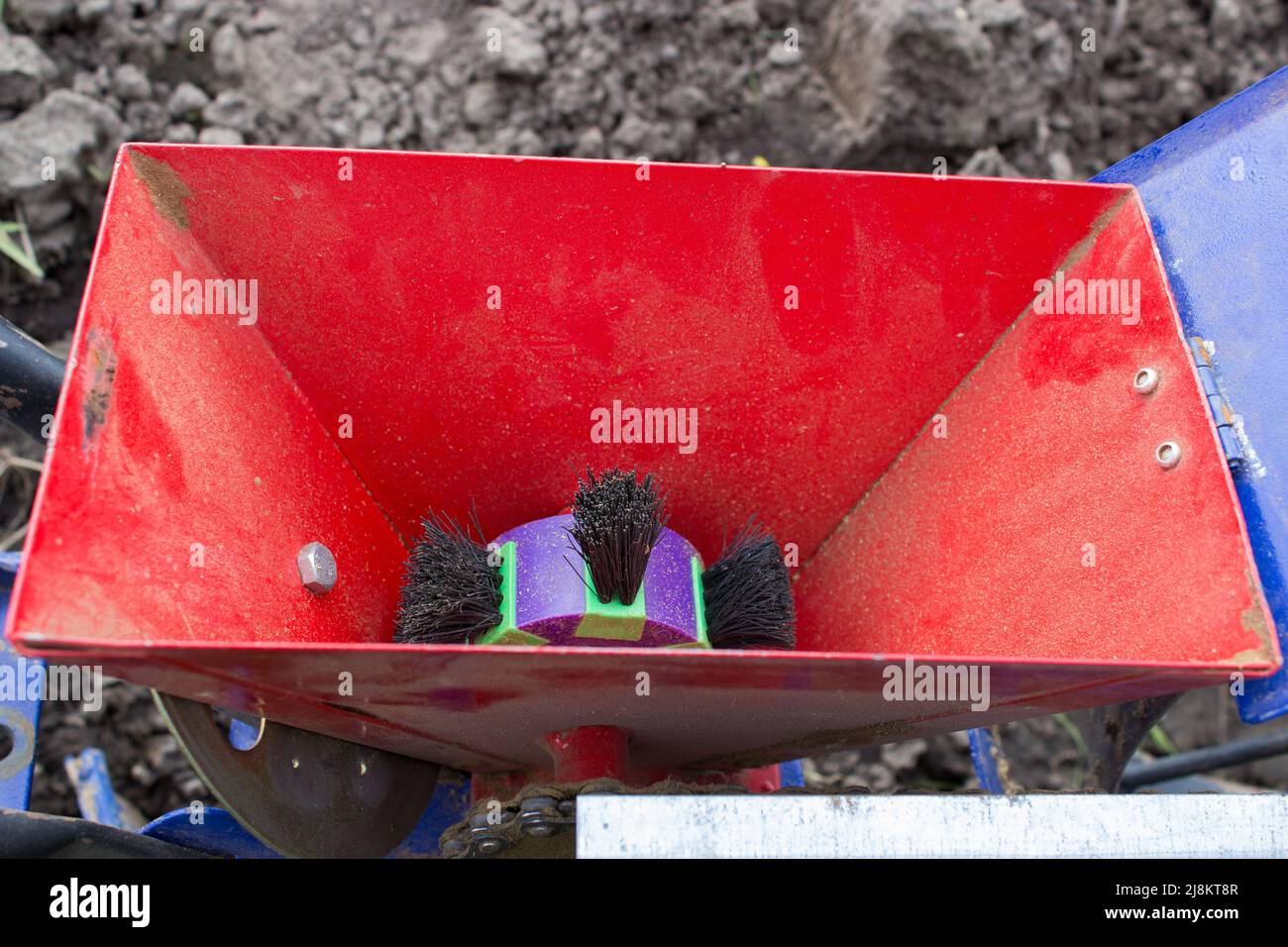 empty seed hopper, hand seeder in agriculture field Stock Photo - Alamy