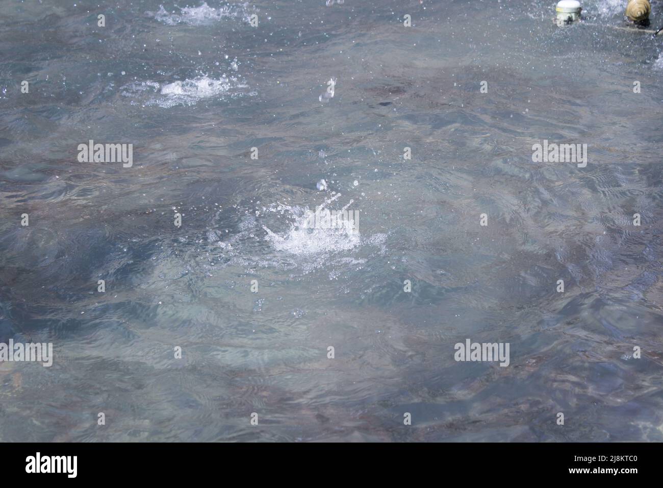 Stream of water falling Stock Photo - Alamy
