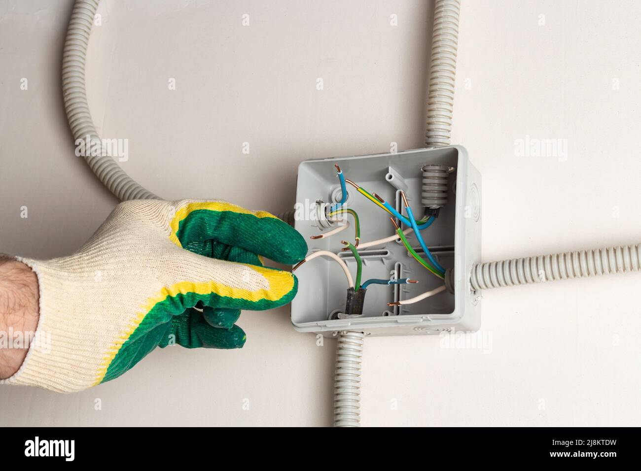 repair of wires and its insulation at home. Hand Stock Photo - Alamy