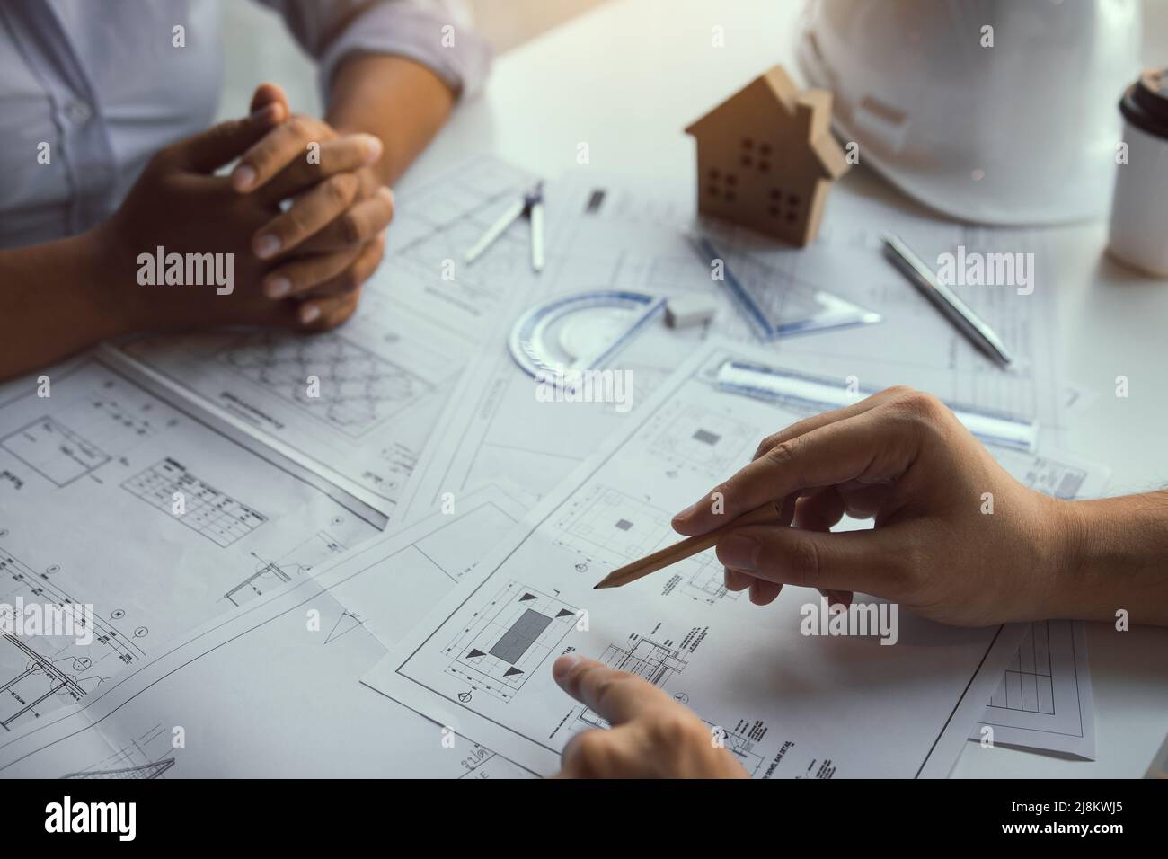 The partnership engineering man or co-workers working on a project and ...