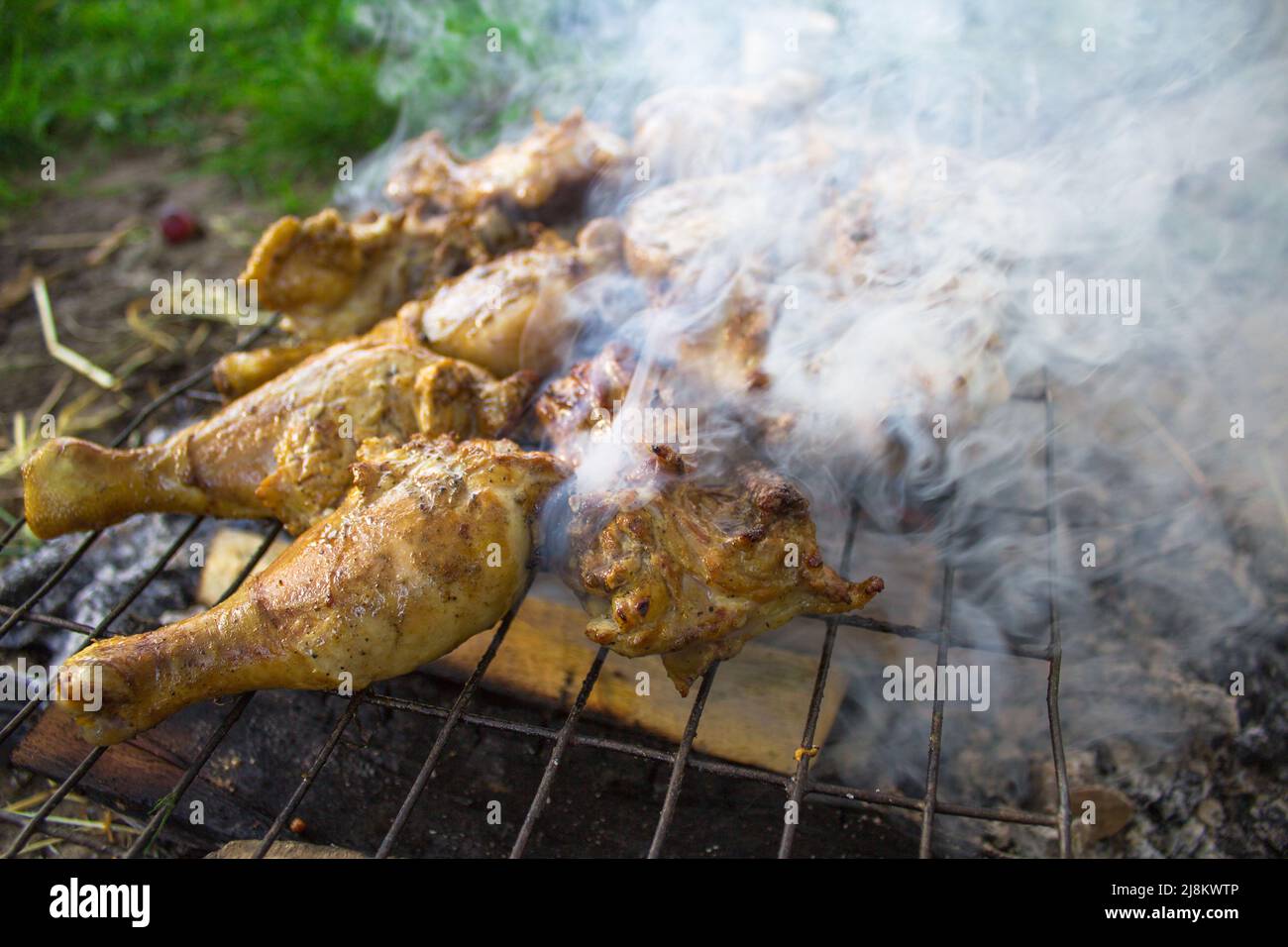 Chicken legs in smoke Stock Photo - Alamy