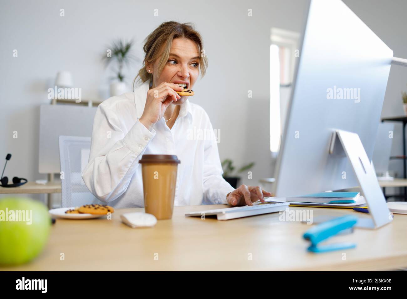 Female desk biscuit hi-res stock photography and images - Alamy