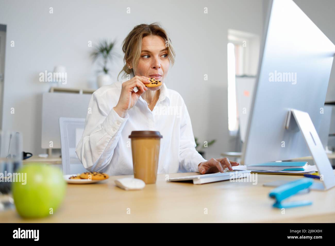 Female working biscuit hi-res stock photography and images - Alamy