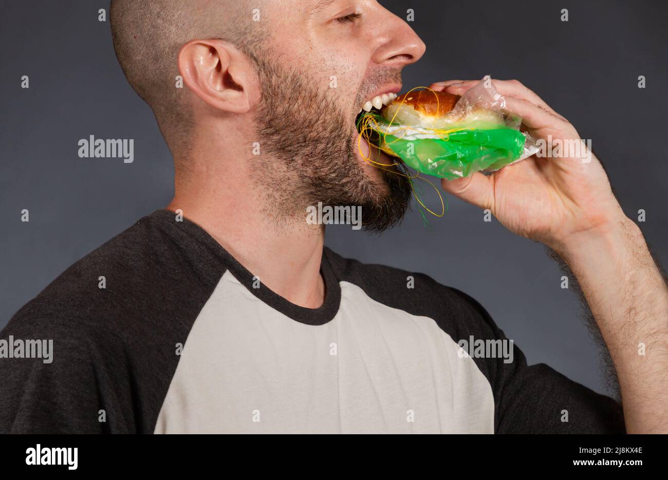 Environmental pollution and food industry. Close up portrait of a bald ...