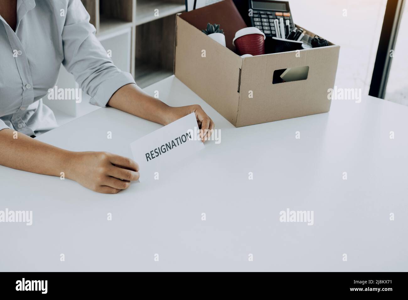 Female employee is about to submit a resignation at his office Stock ...