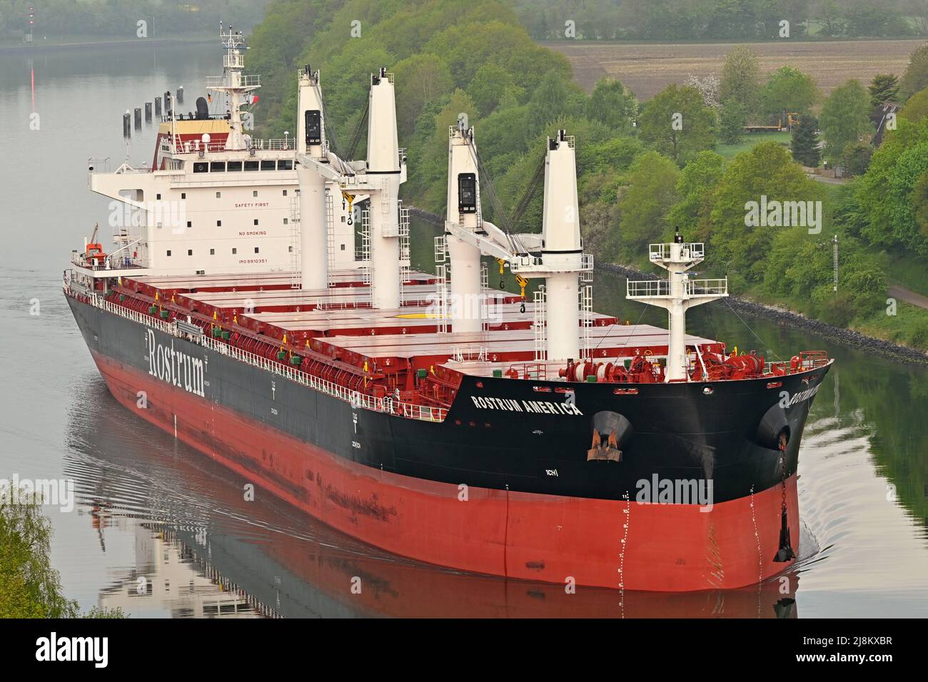 Bulkcarrier ROSTRUM AMERICA passing the Kiel Canal Stock Photo - Alamy
