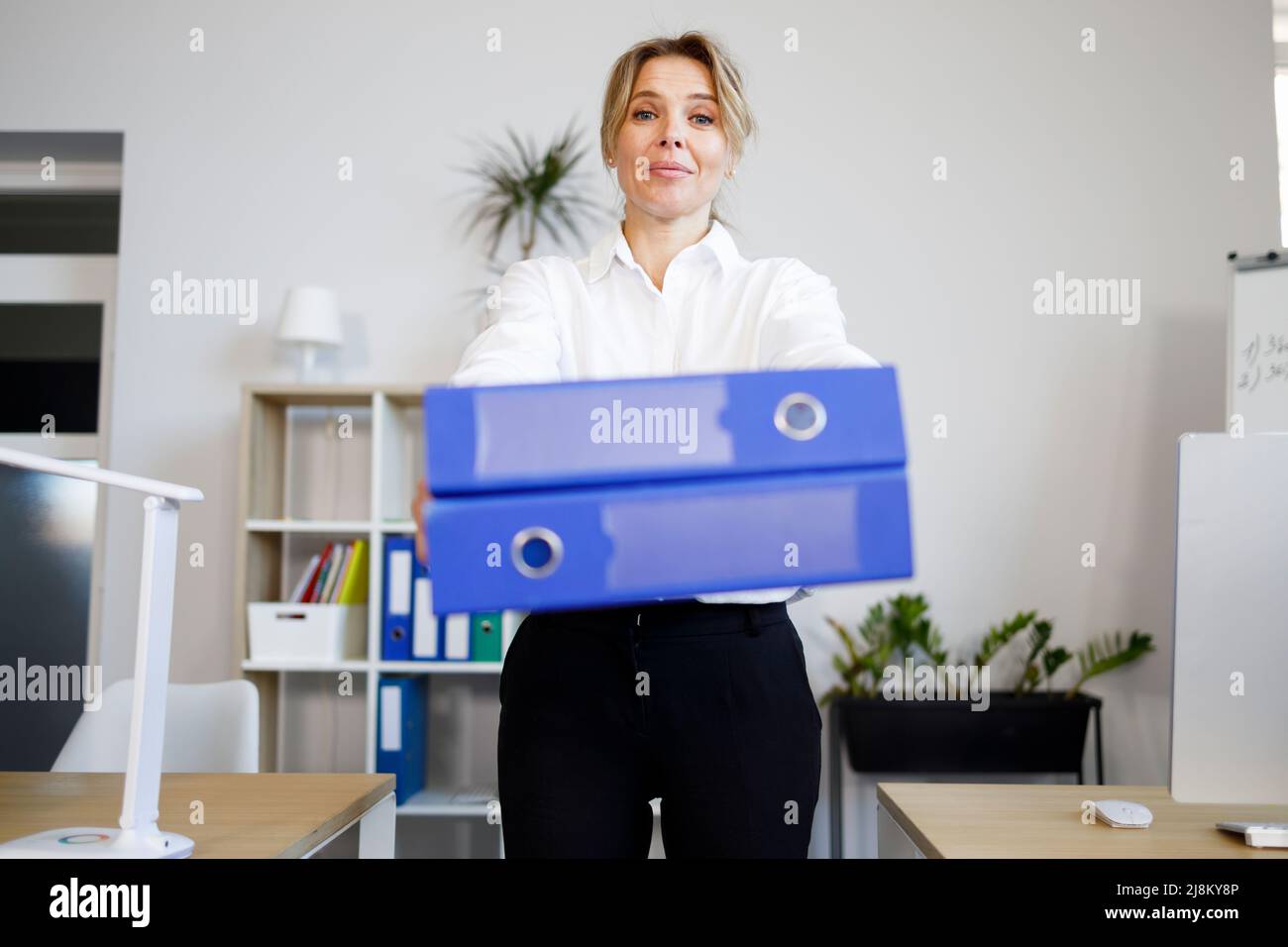Overworked secretary in office hi-res stock photography and images - Alamy