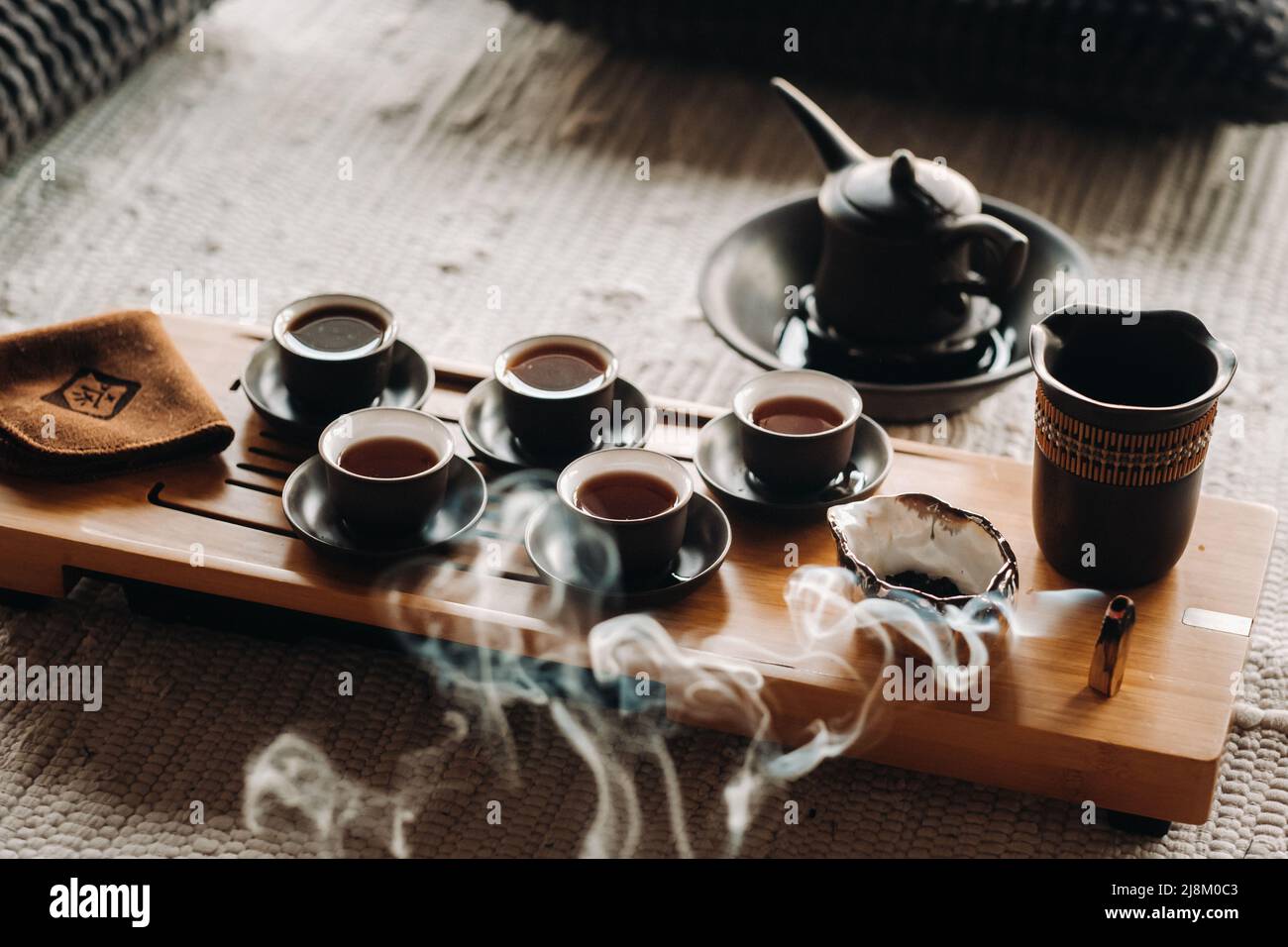 Tea ceremony with smoking incense. Incense stick and tea ceremony Stock ...