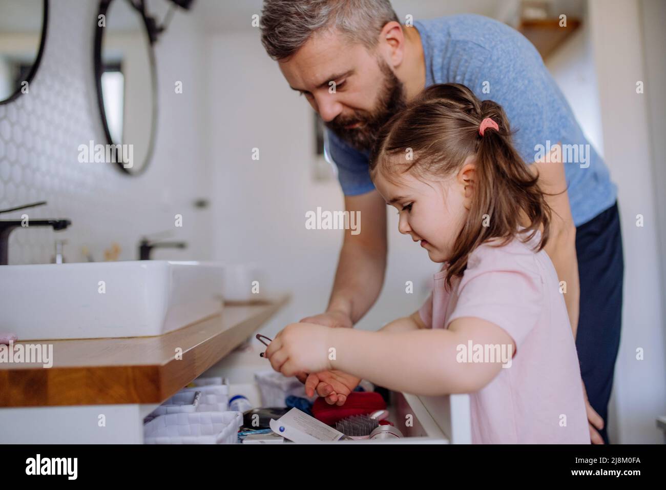 Happy father with his little daughter in bathroom, morning routine concept Stock Photo - Alamy