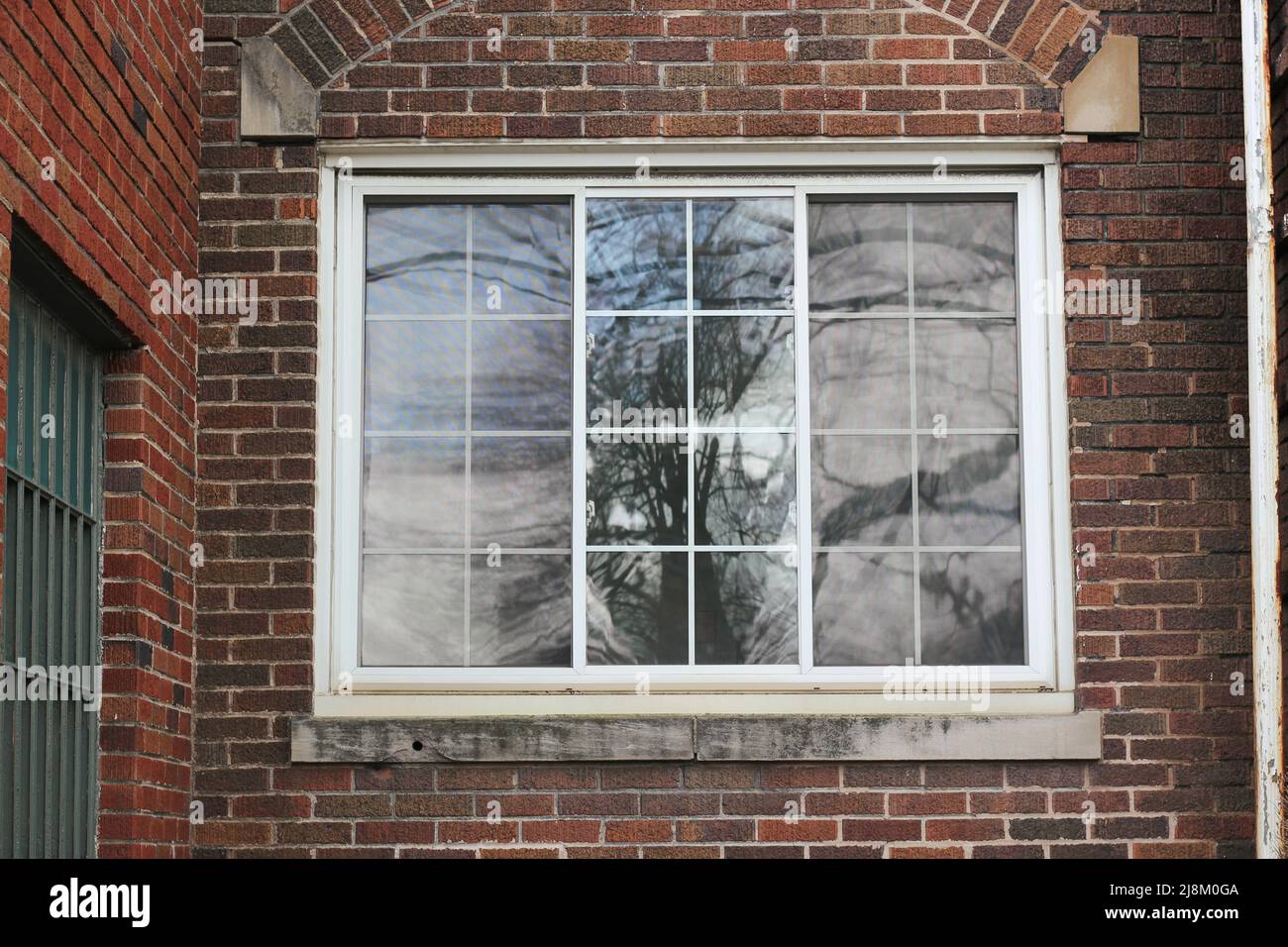 Vintage windows on the wall of an old abandoned factory Stock Photo - Alamy