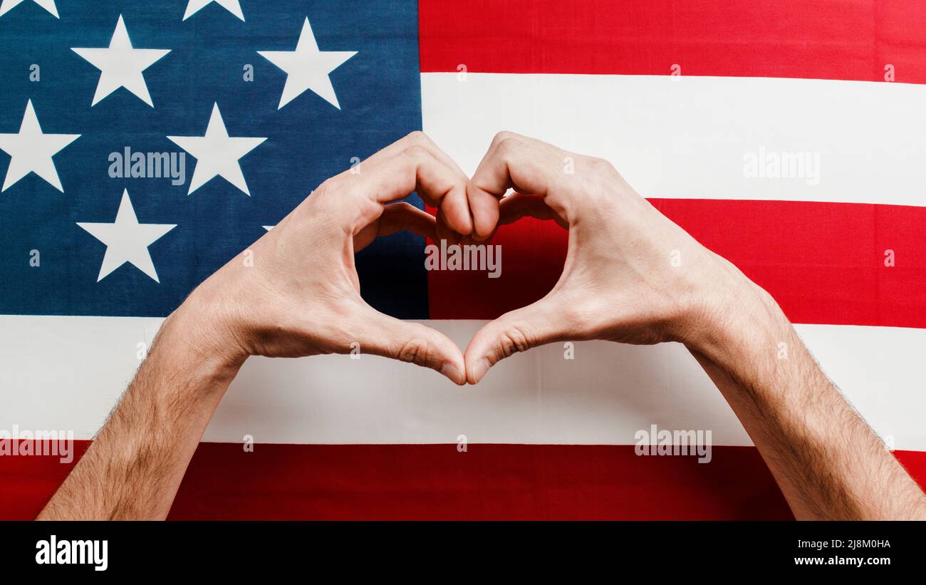 hand in heart shape on american flag Stock Photo - Alamy