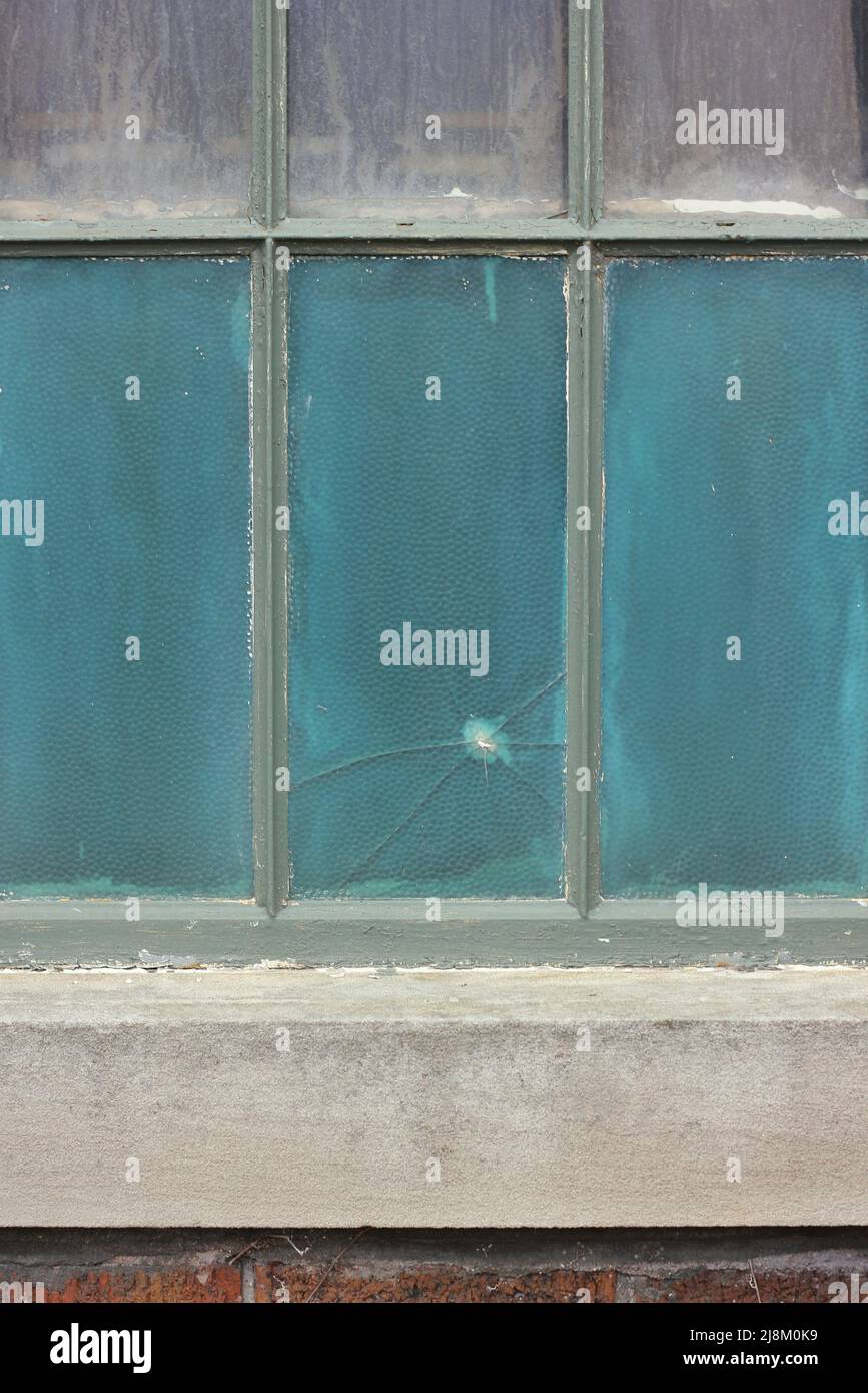 Vintage windows on the wall of an old abandoned factory Stock Photo - Alamy