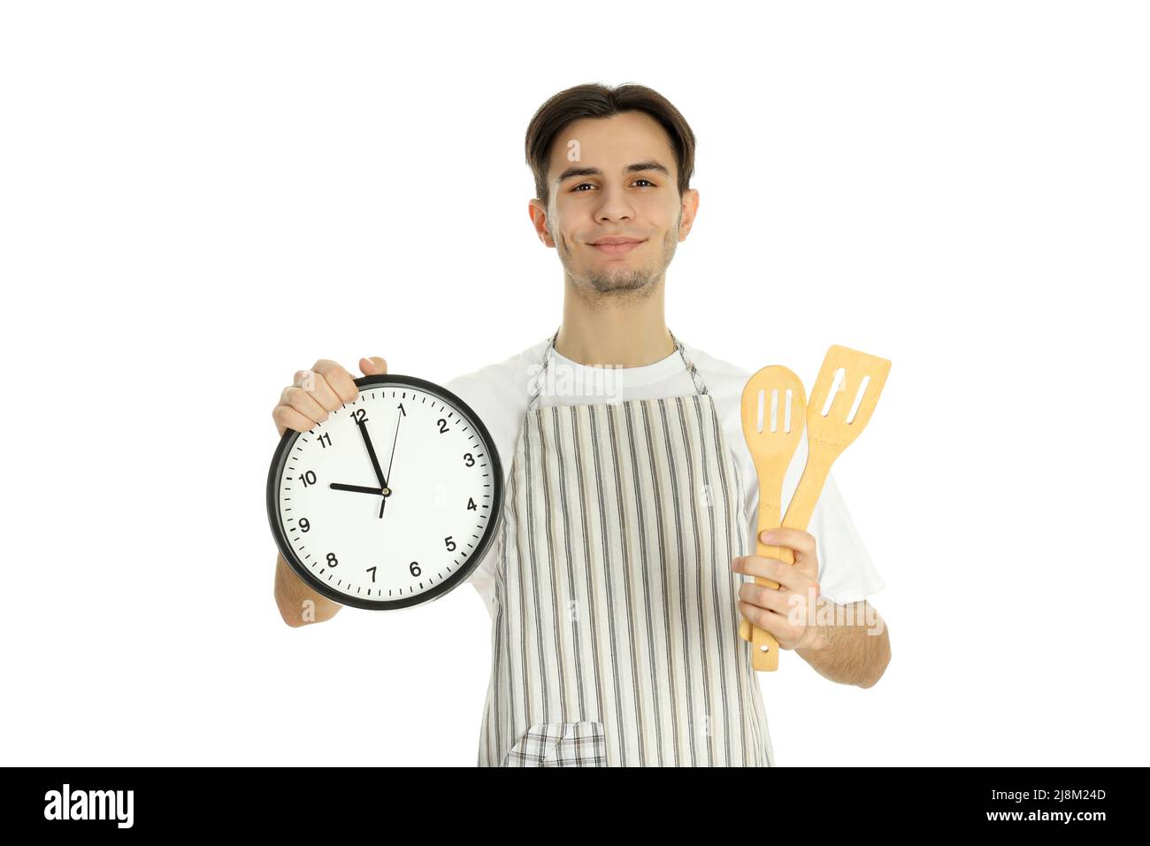 Concept of cooking, young man chef isolated on white background Stock ...