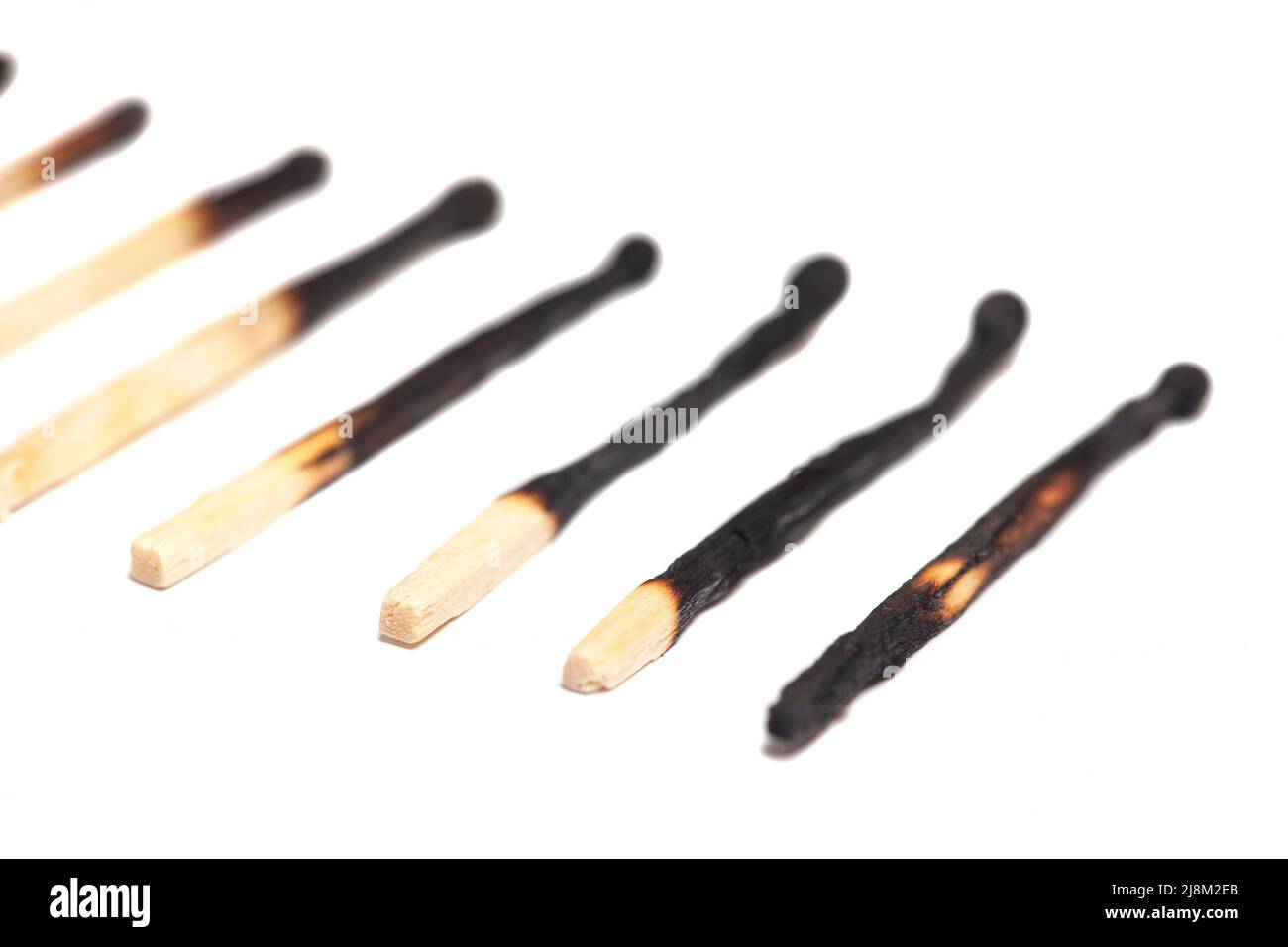 Different stages of match burning. Burnt matches isolated on white ...