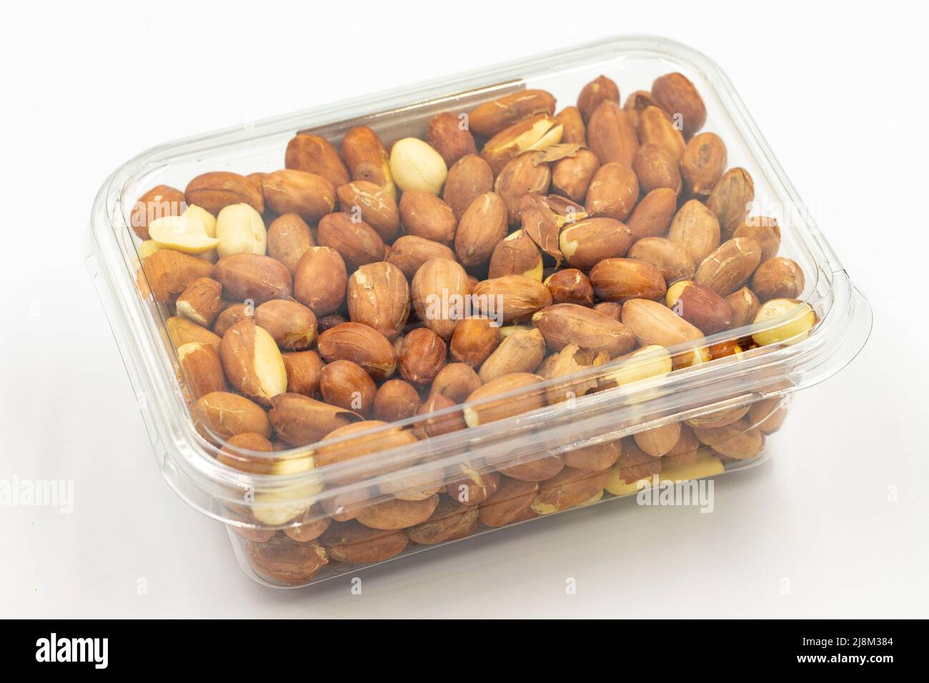 Packed peanuts kernel on a white background. Close-up. local name ...