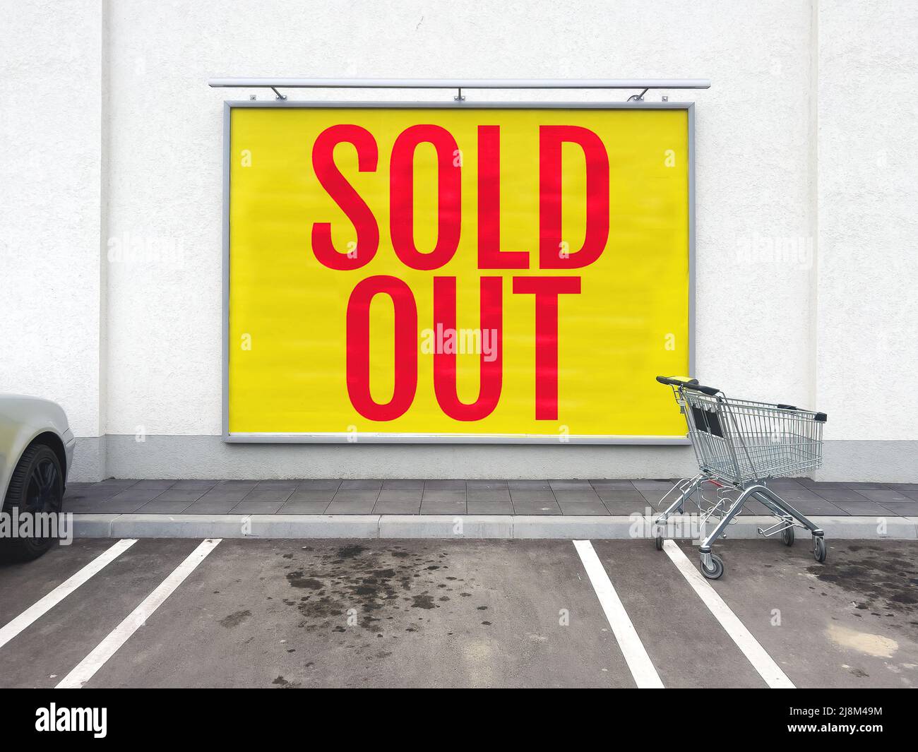 Sold out billboard poster at supermarket retail store wall, red letters ...