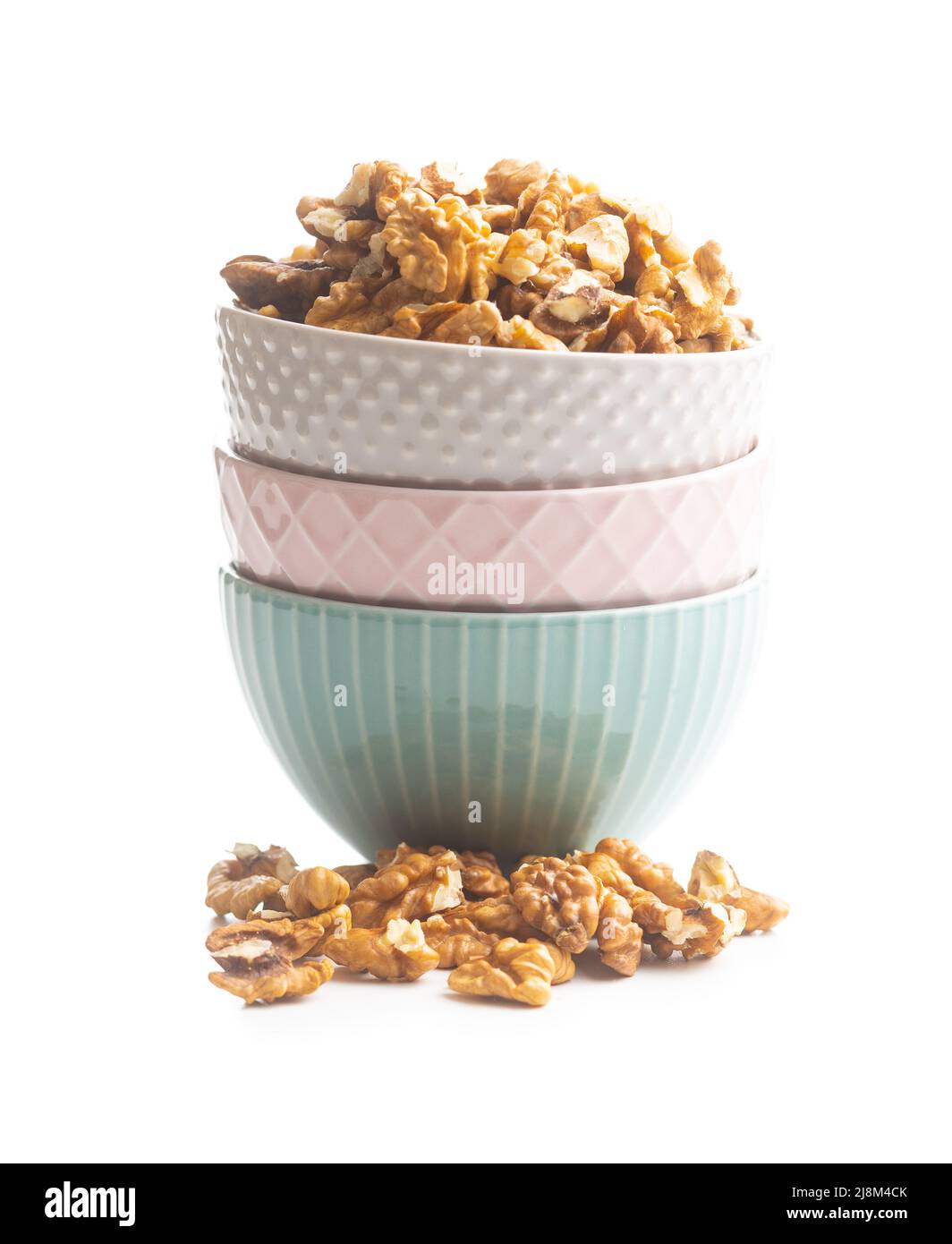 Peeled walnut kernels in bowl isolated on a white background Stock ...