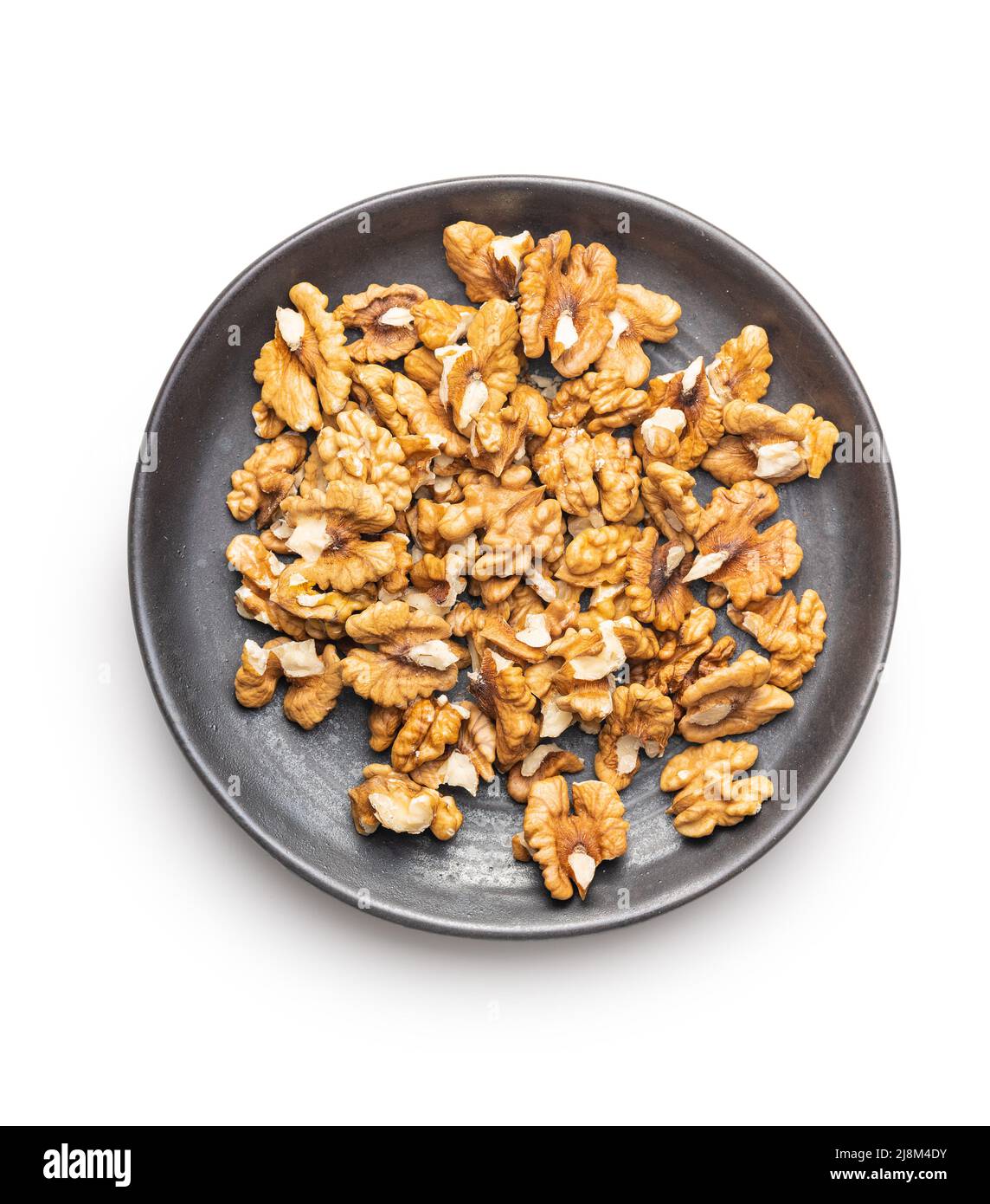 Peeled walnut kernels on plate isolated on a white background Stock ...