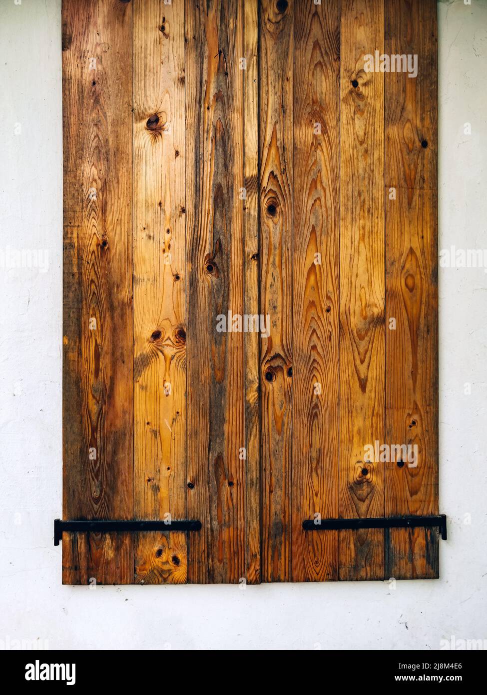 Old closed wooden window shutters as background Stock Photo - Alamy