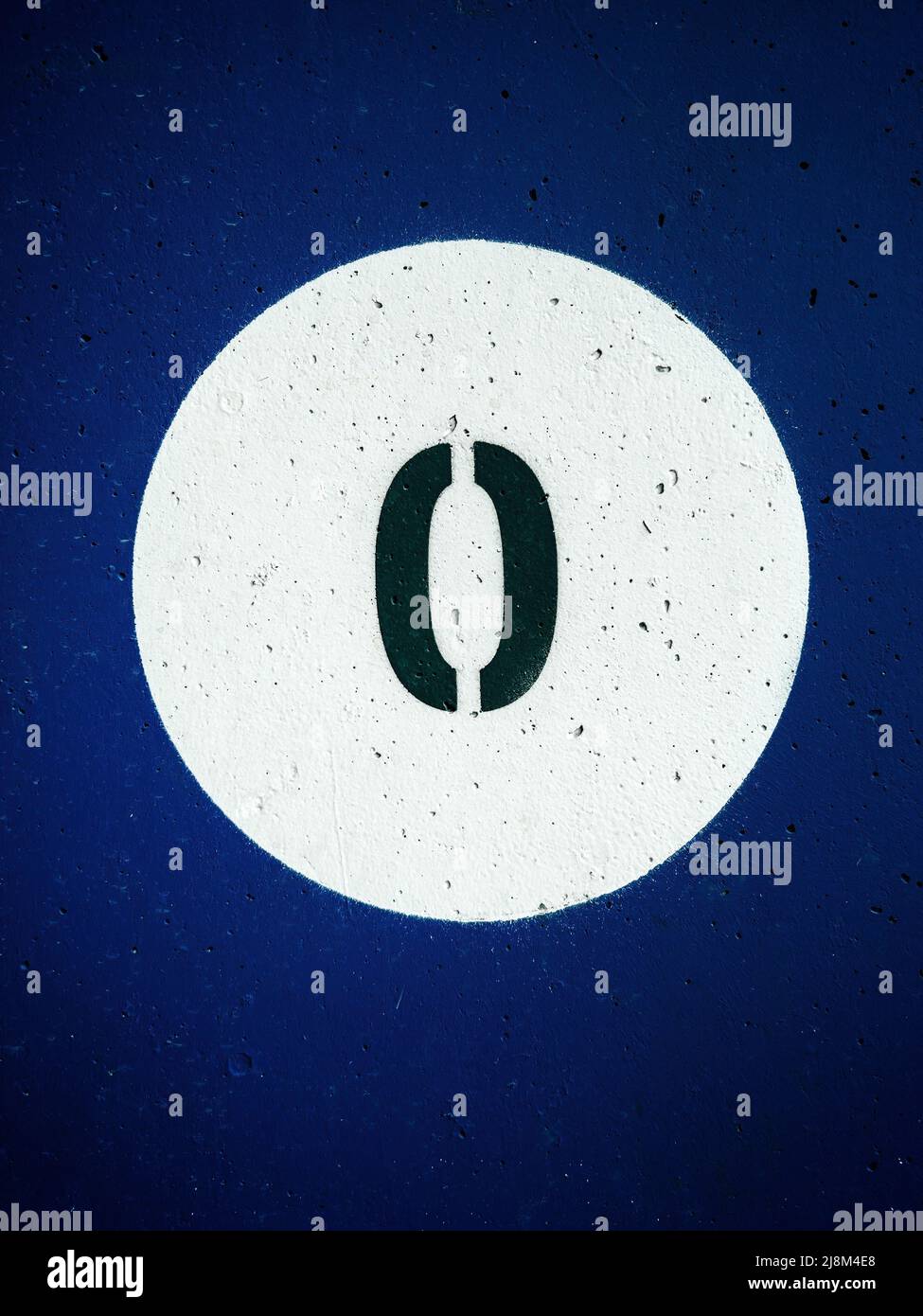 Zero number, ground level of underground garage, urban signs and ...