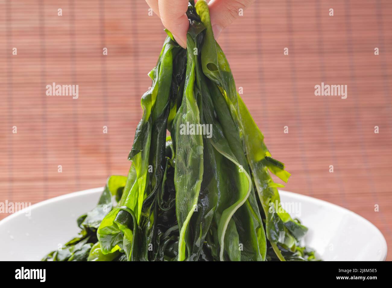 Marine green food gourmet kelp wakame Stock Photo - Alamy