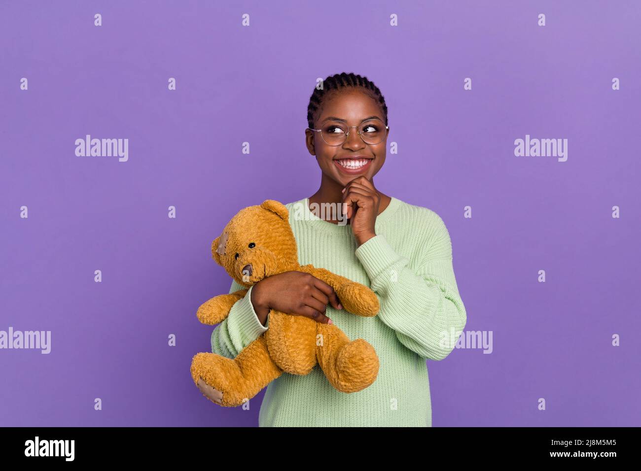 Photo of cheerful cunning young female look blank space happy to have a ...