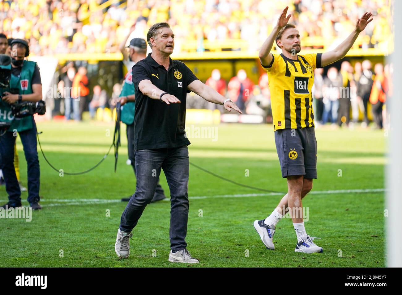 DORTMUND, GERMANY - MAY 14: Michael Zorc of Borussia Dortmund and ...