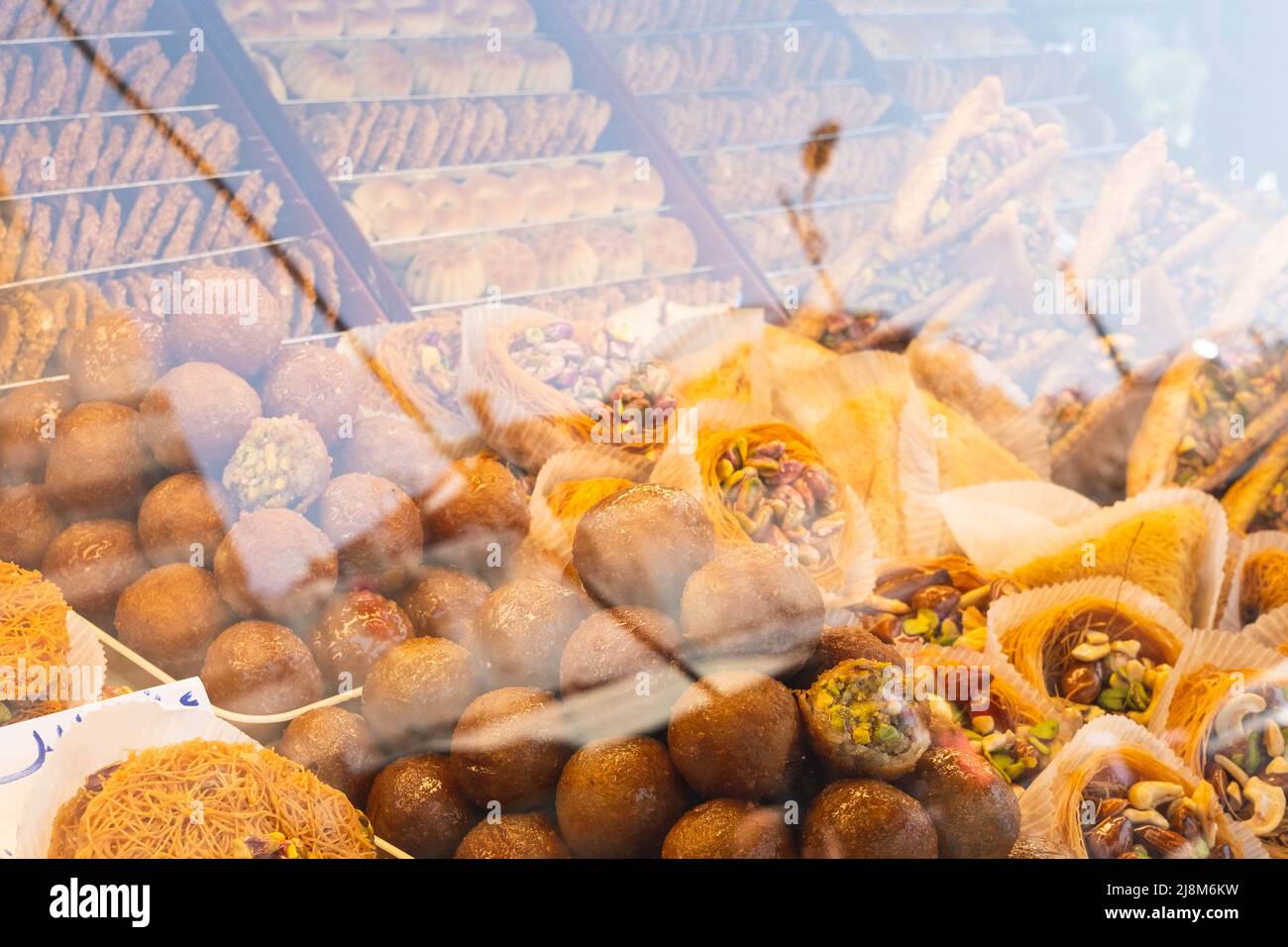 variety of arabic sweets and dessert, baklava in pastry and bakery shop ...