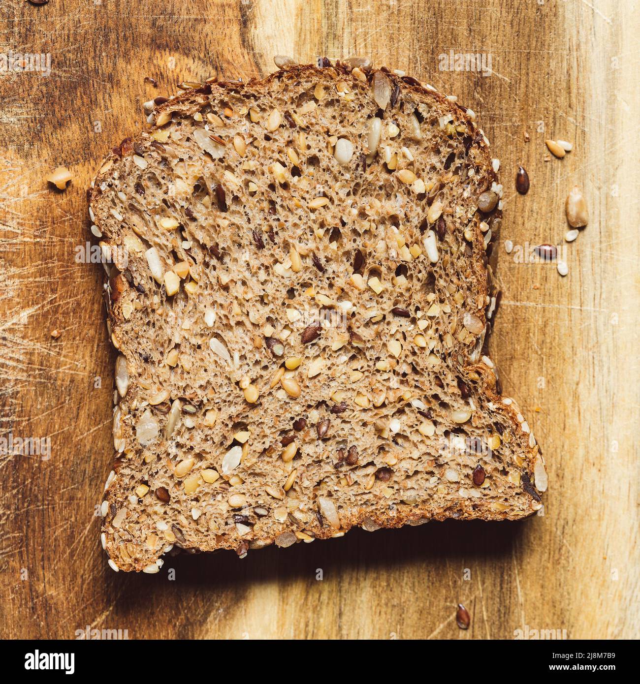 Directly above shot of a slice of wholegrain, soya and Linseed bread ...