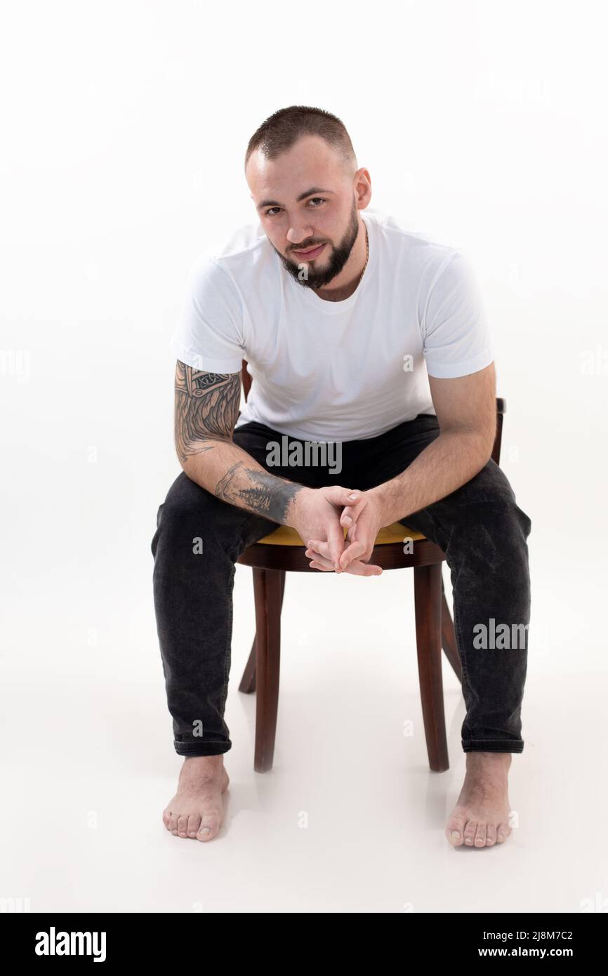 Barefoot man jeans hi-res stock photography and images - Alamy