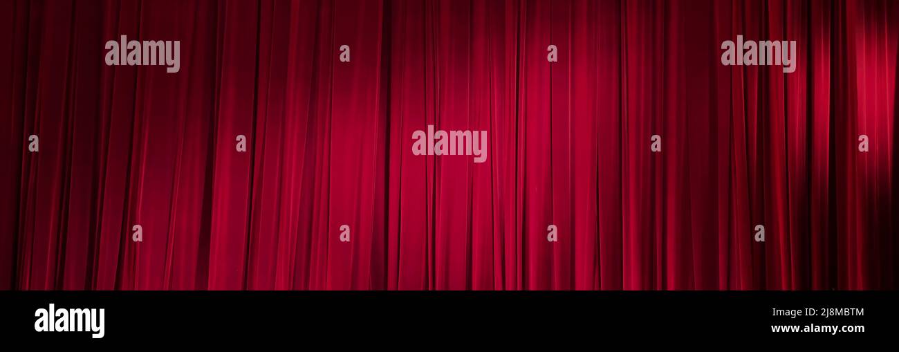 Background image of a red velvet stage curtain Stock Photo - Alamy