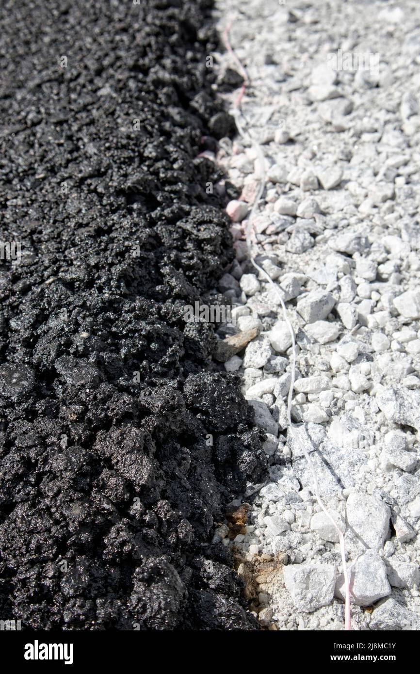 layer of fresh black asphalt on grey gravel Stock Photo - Alamy