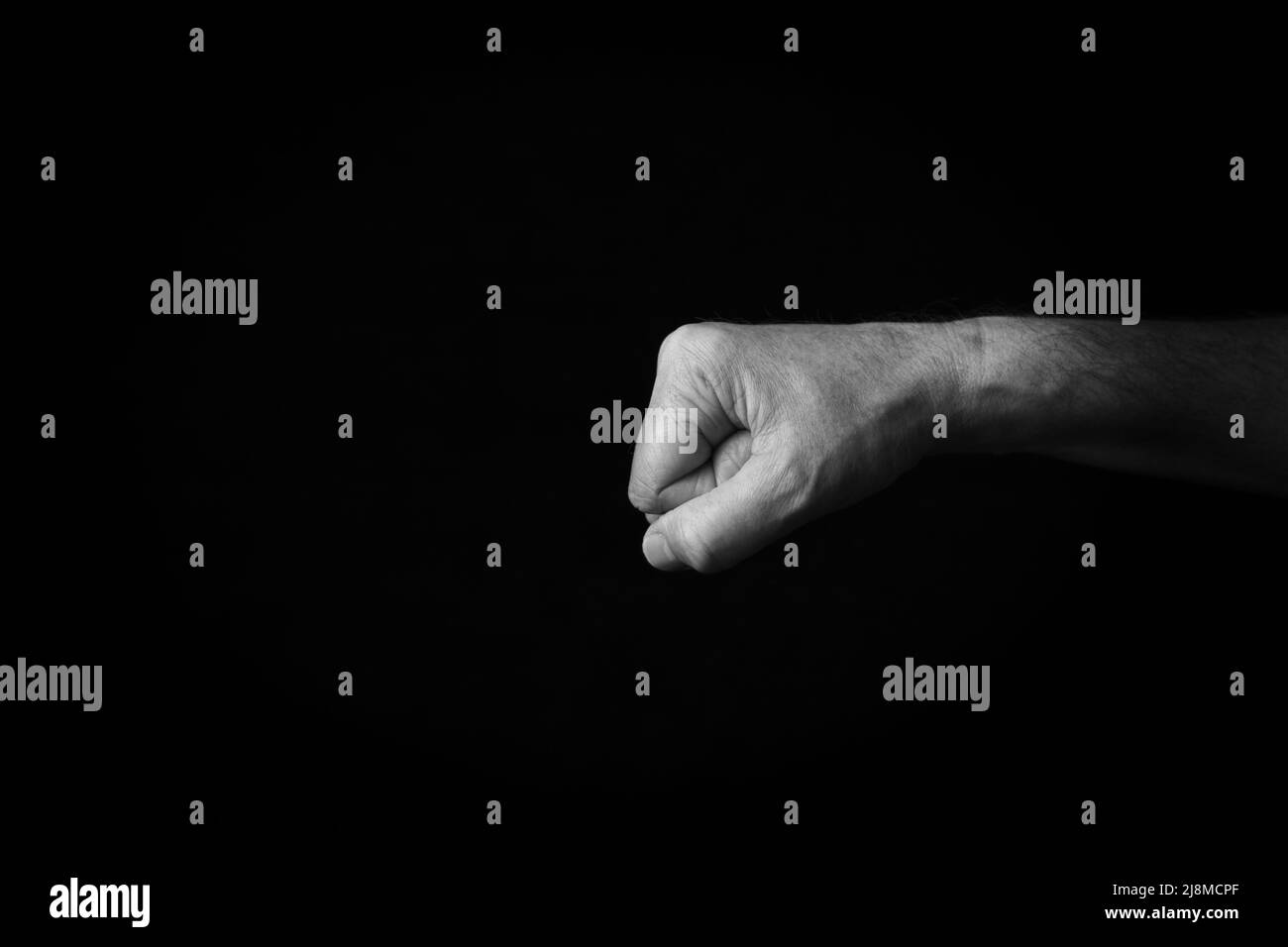 Dramatic black and white image of Left Facing Fist emoji isolated on ...