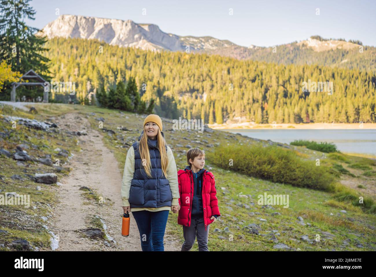 Mom and son tourists in background of Panoramic morning view of Black ...