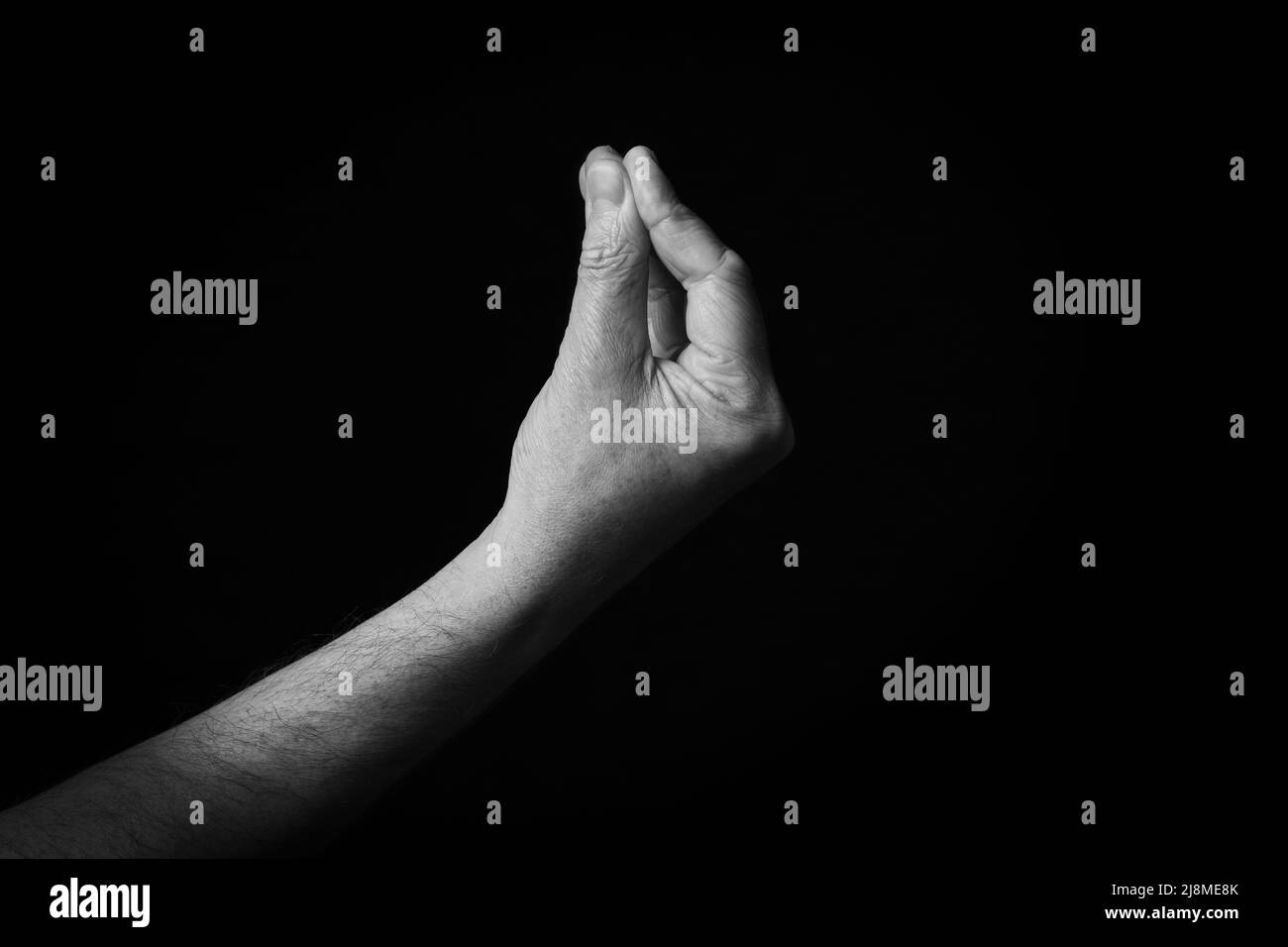 Dramatic black and white image of Pinched Fingers emoji isolated on ...