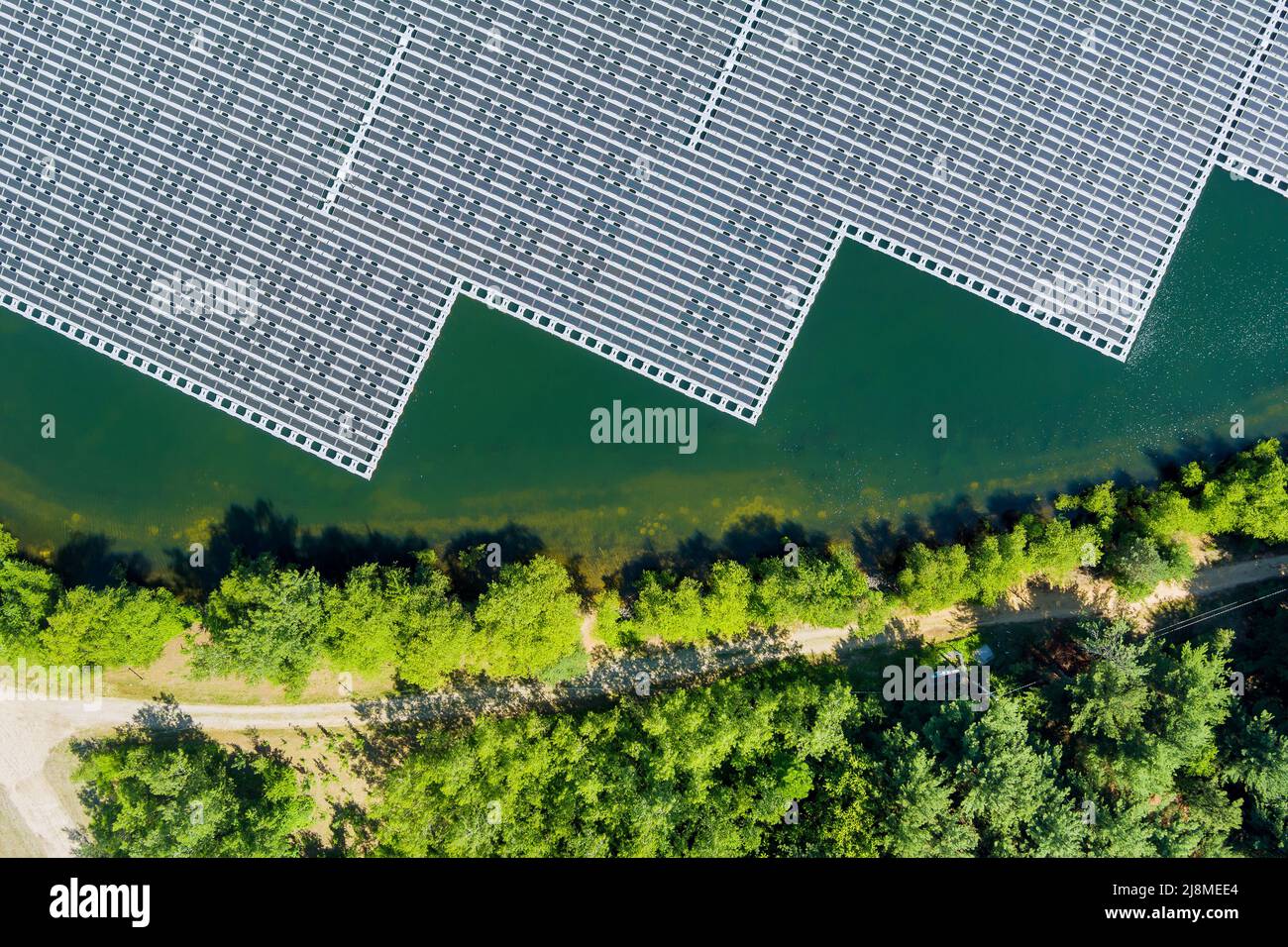 Floating solar panels on the water in pond with aerial view Stock Photo ...