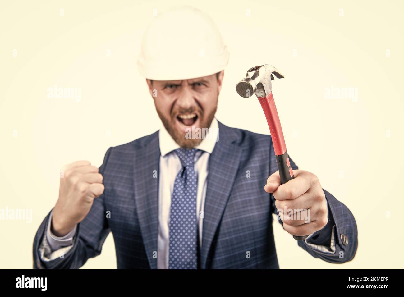 Im nailing it. Crazy engineer hold hammer selective focus. Hammer work ...