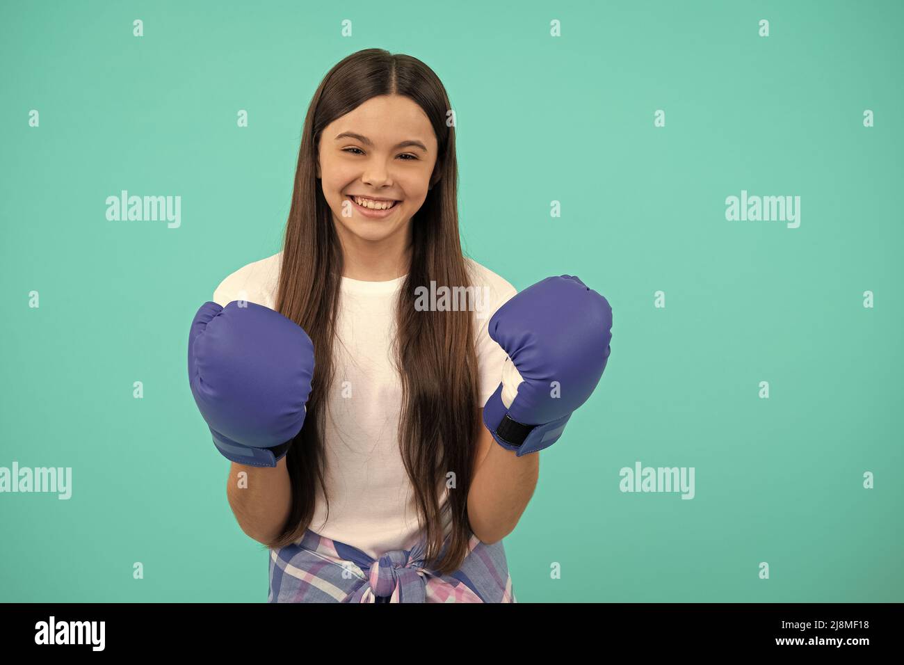 successful child boxer in boxing gloves during sport training, copy ...