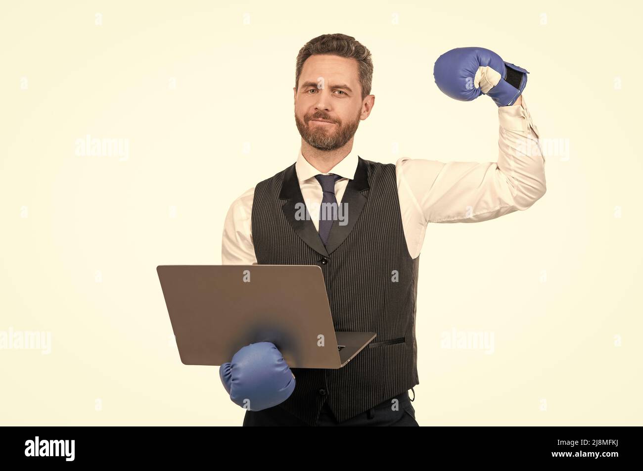 smiling guy in boxing gloves and formalwear hold computer isolated on ...