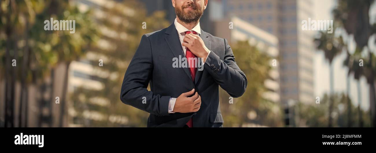 successful man in businesslike suit. manager executive outside the ...