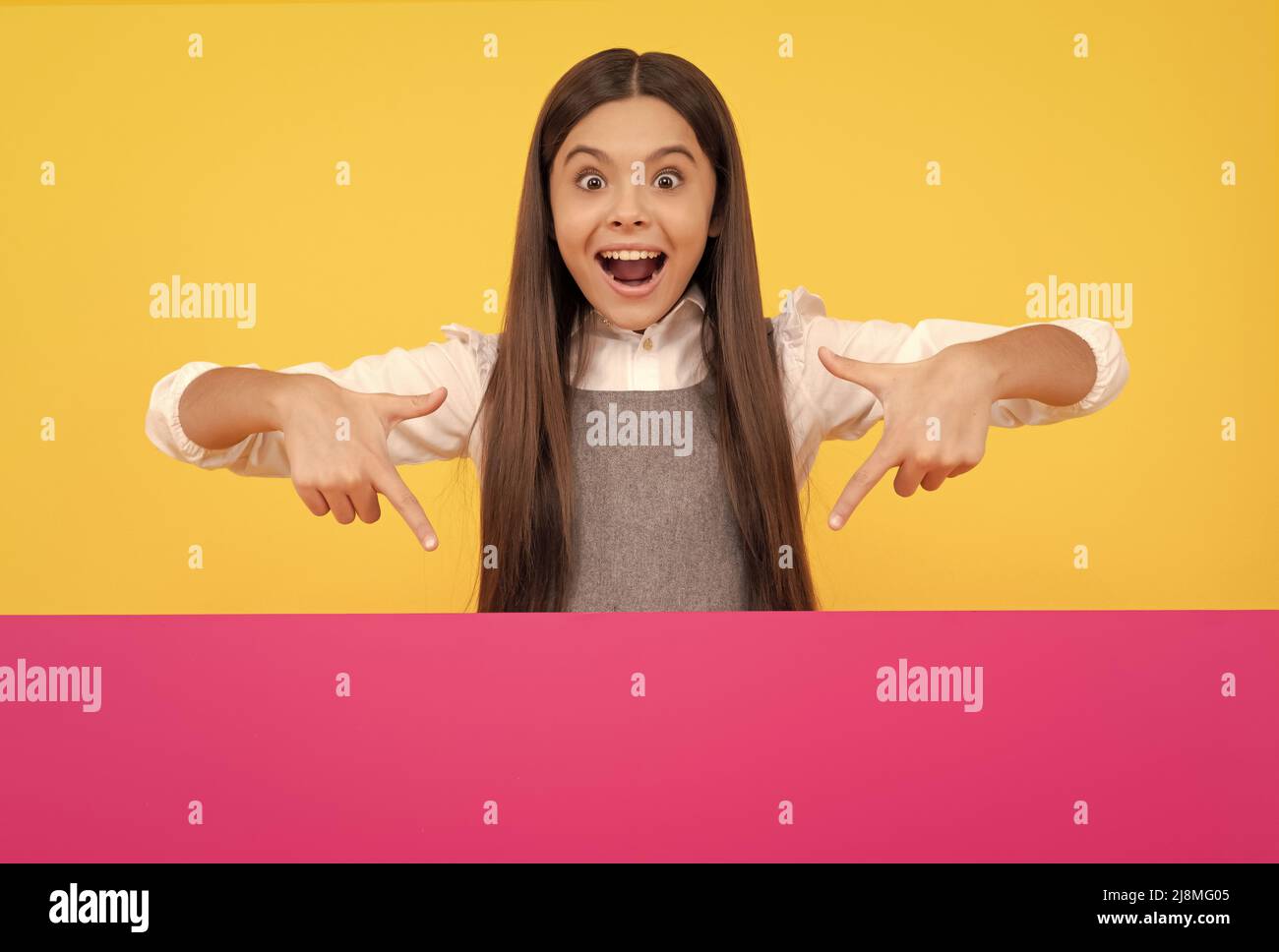 Surprised girl child pointing blank hi-res stock photography and images ...