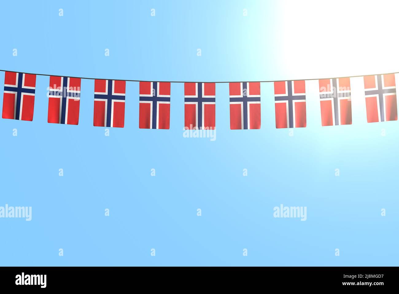 nice many Norway flags or banners hanging on rope on blue sky ...