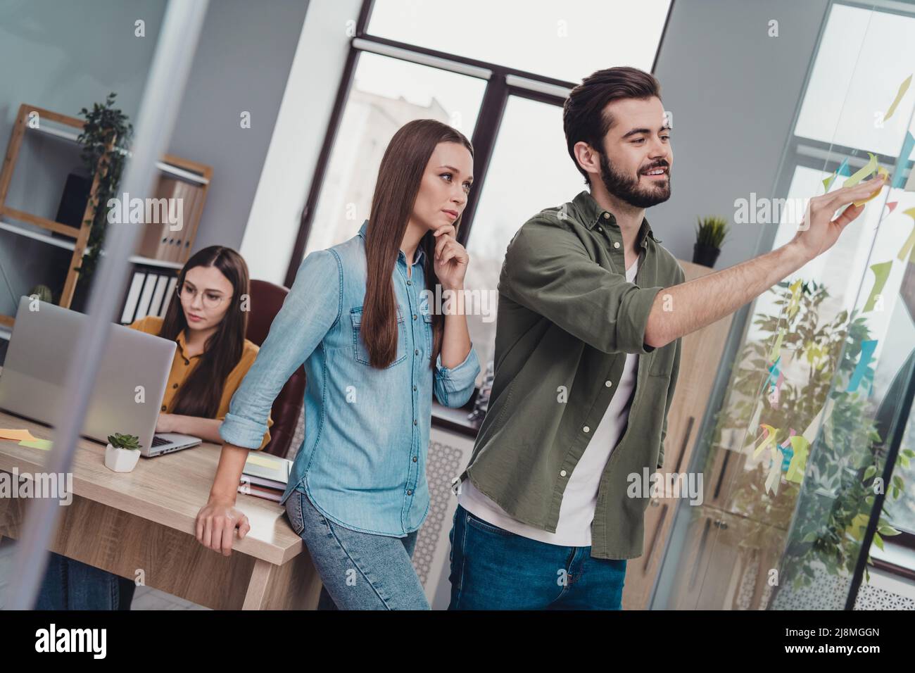 Male students discuss paper hi-res stock photography and images - Alamy