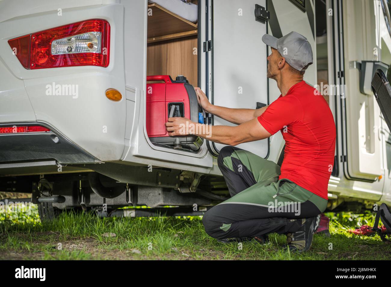 Caucasian Men in His 40s Removing Portable Gas Generator From His ...