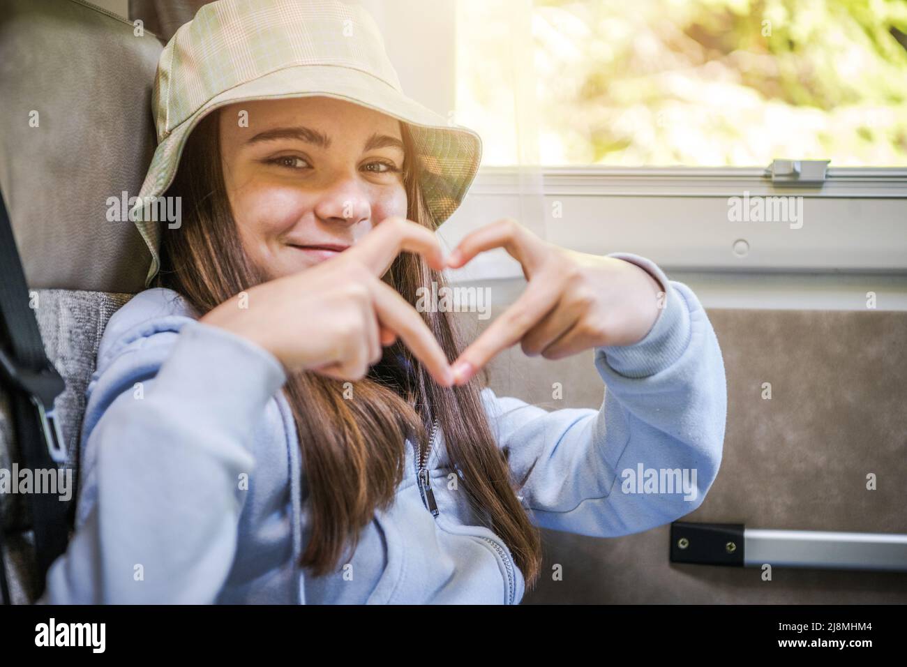 Vacation Road Trip Theme. Caucasian Girl Sharing Love Straight From a ...