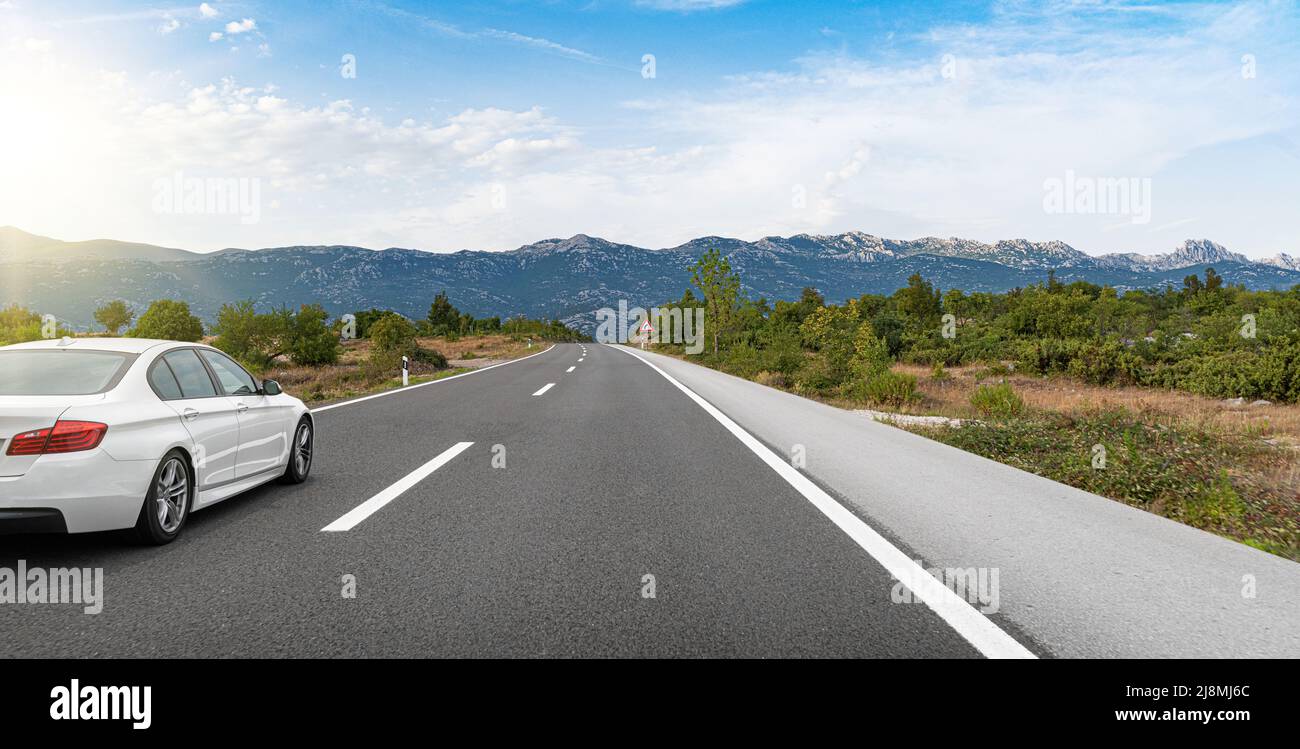 Car drives along country road hi-res stock photography and images - Alamy