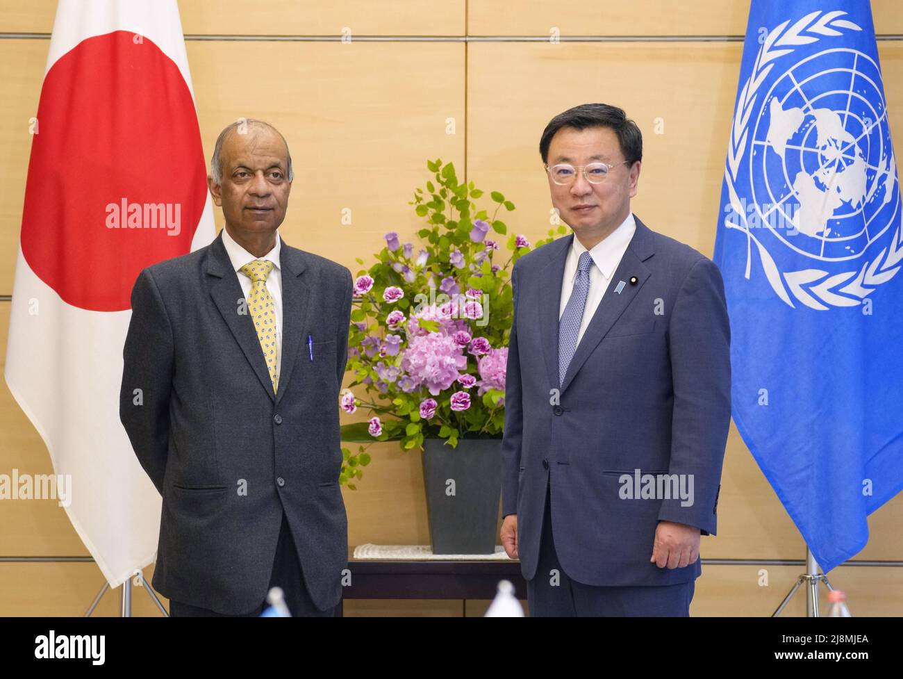 Tokyo, Japan, May 17, 2022. Atul Khare (L), the U.N. under-secretary ...