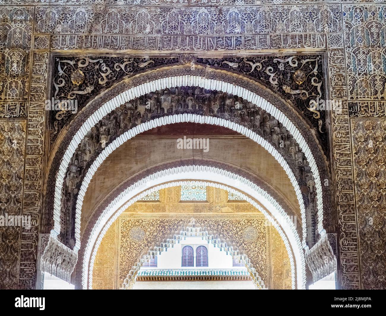 Ornate arched door with arabesque and Mocarabe designs in Comares ...