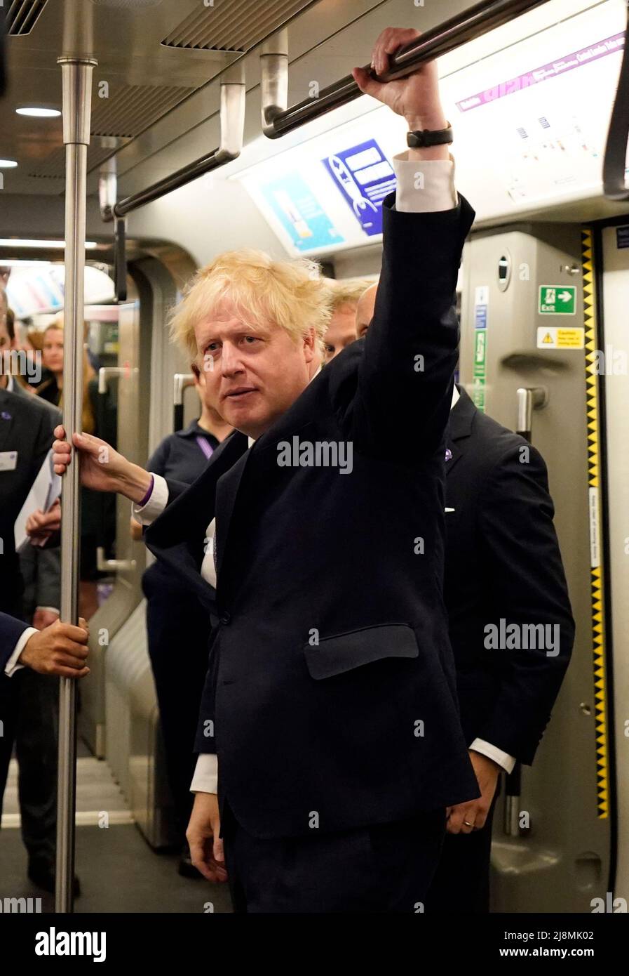 Prime Minister Boris Johnson rides on a Elizabeth Line train at ...