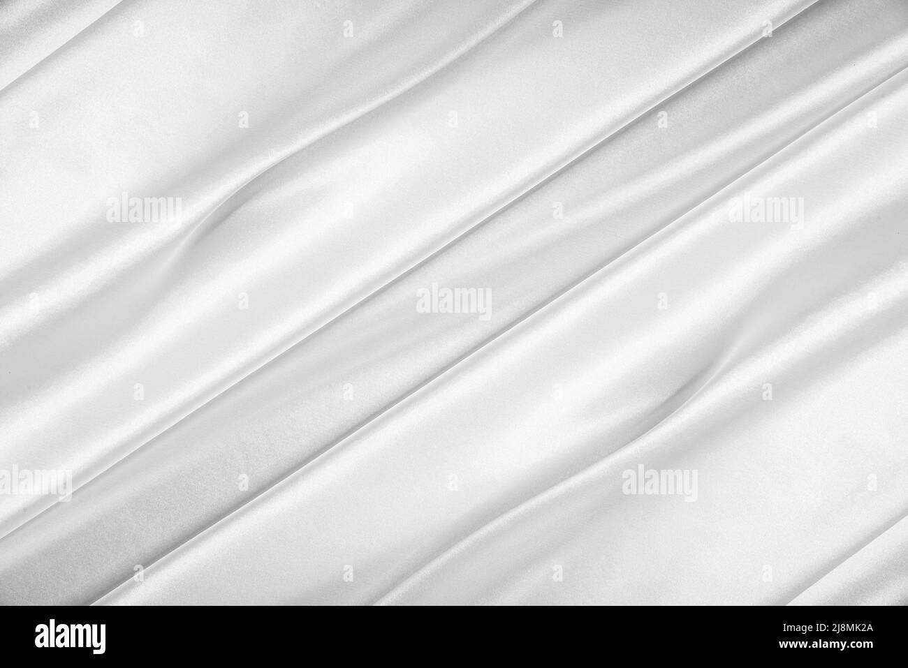 Closeup of rippled white silk fabric Stock Photo - Alamy